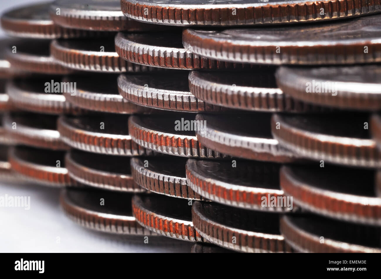 Silver american coins align in vertical columns Stock Photo - Alamy