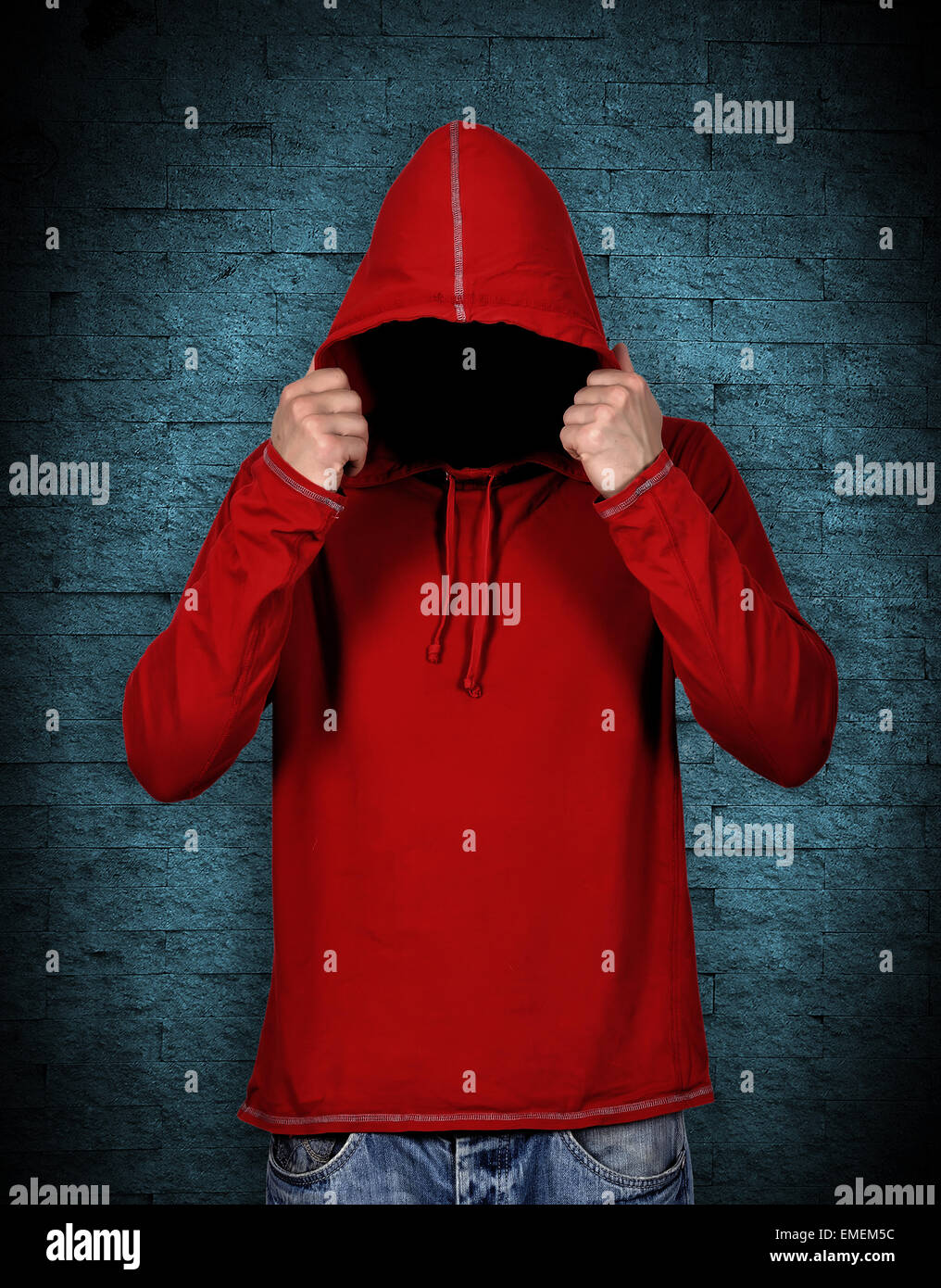 Hooded person in dark street hi-res stock photography and images - Alamy