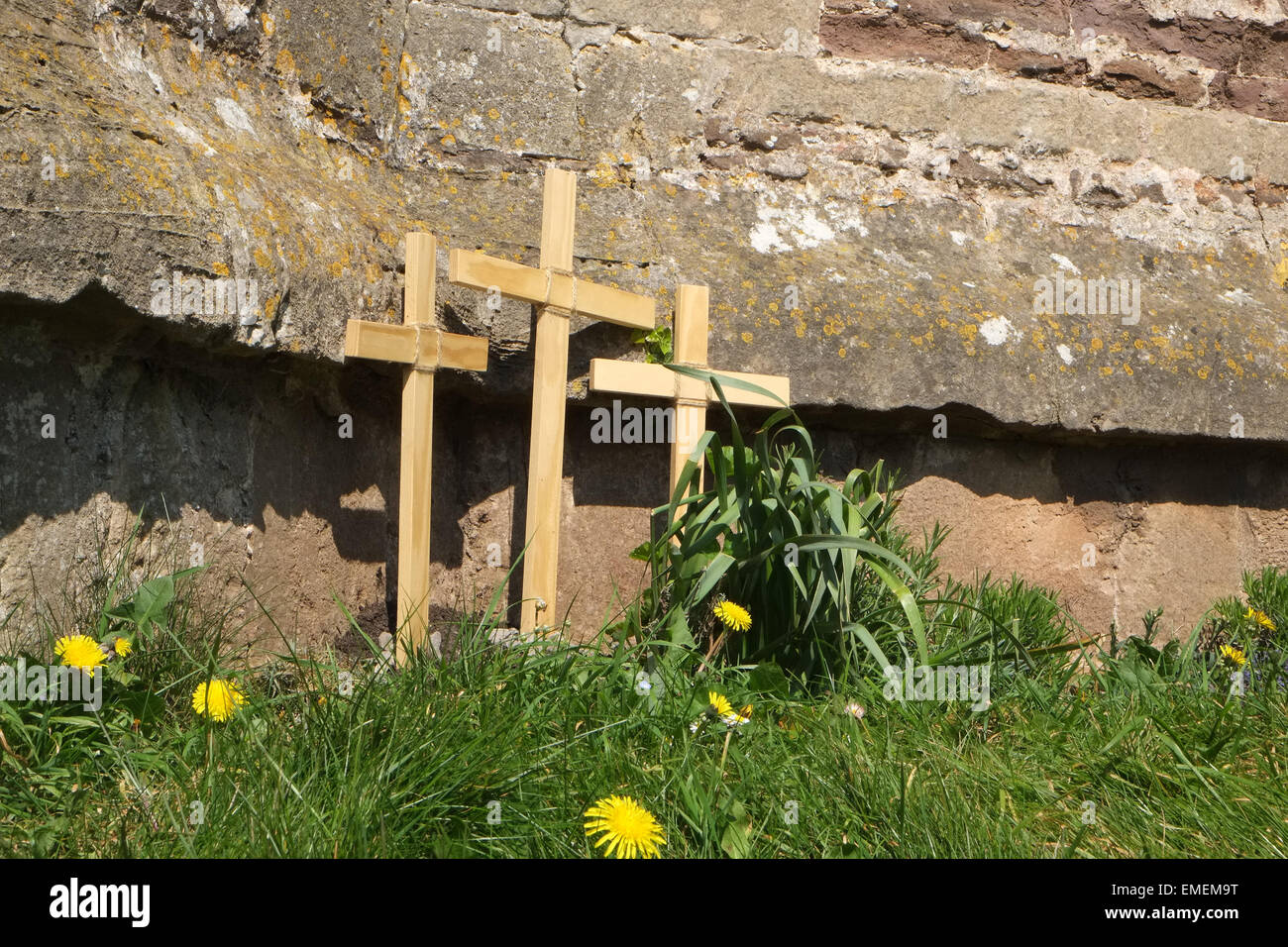 Three small Easter crosses beside an rural English country church 20th ...