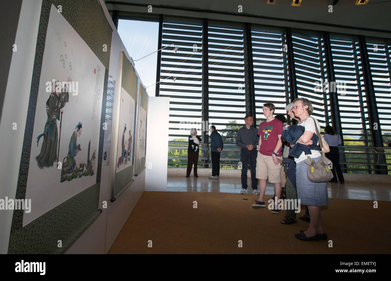 Geneva, Switzerland. 20th Apr, 2015. People watch Chinese paper-cut ...