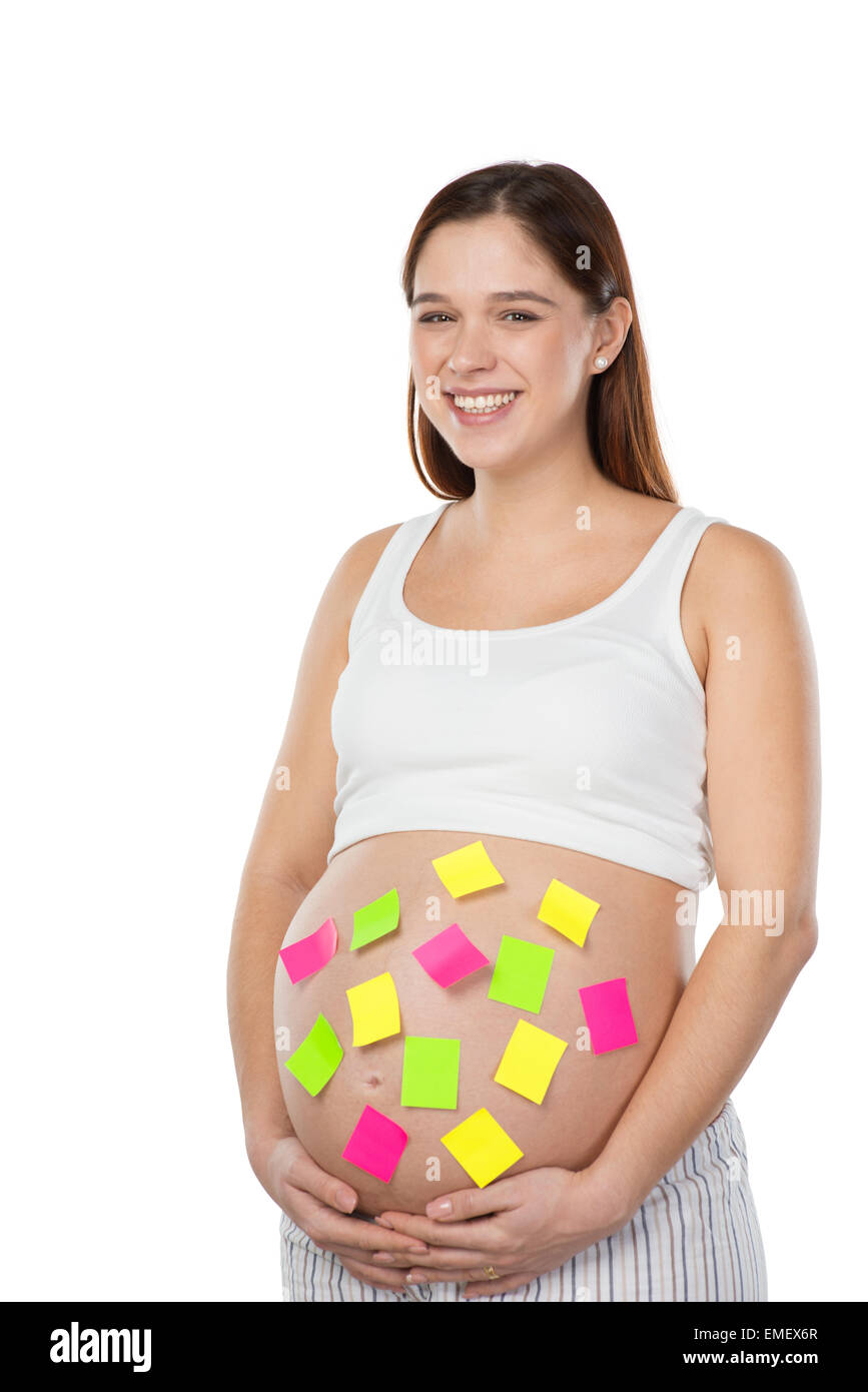 Smiling pregnant woman with colorful paper stickers on her belly Stock ...