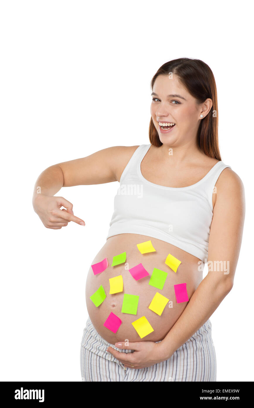 Smiling pregnant woman with colorful paper stickers on her belly Stock ...
