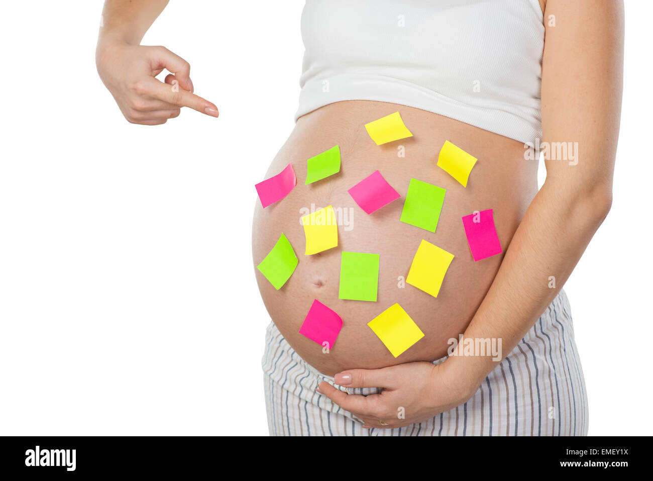 Close up of pregnant woman with colorful paper stickers Stock Photo - Alamy
