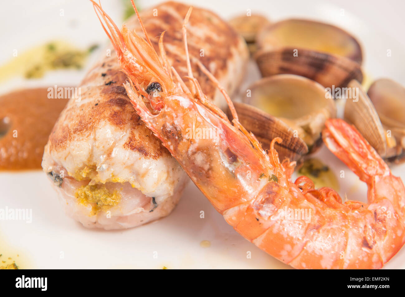 Hake stuffed with spider crab in american sauce Stock Photo - Alamy