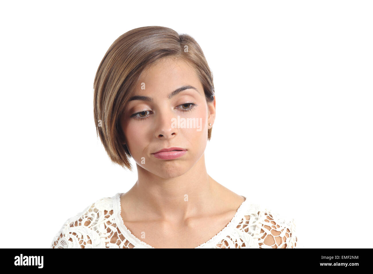 Portrait of a woman with bored expression isolated on a white ...