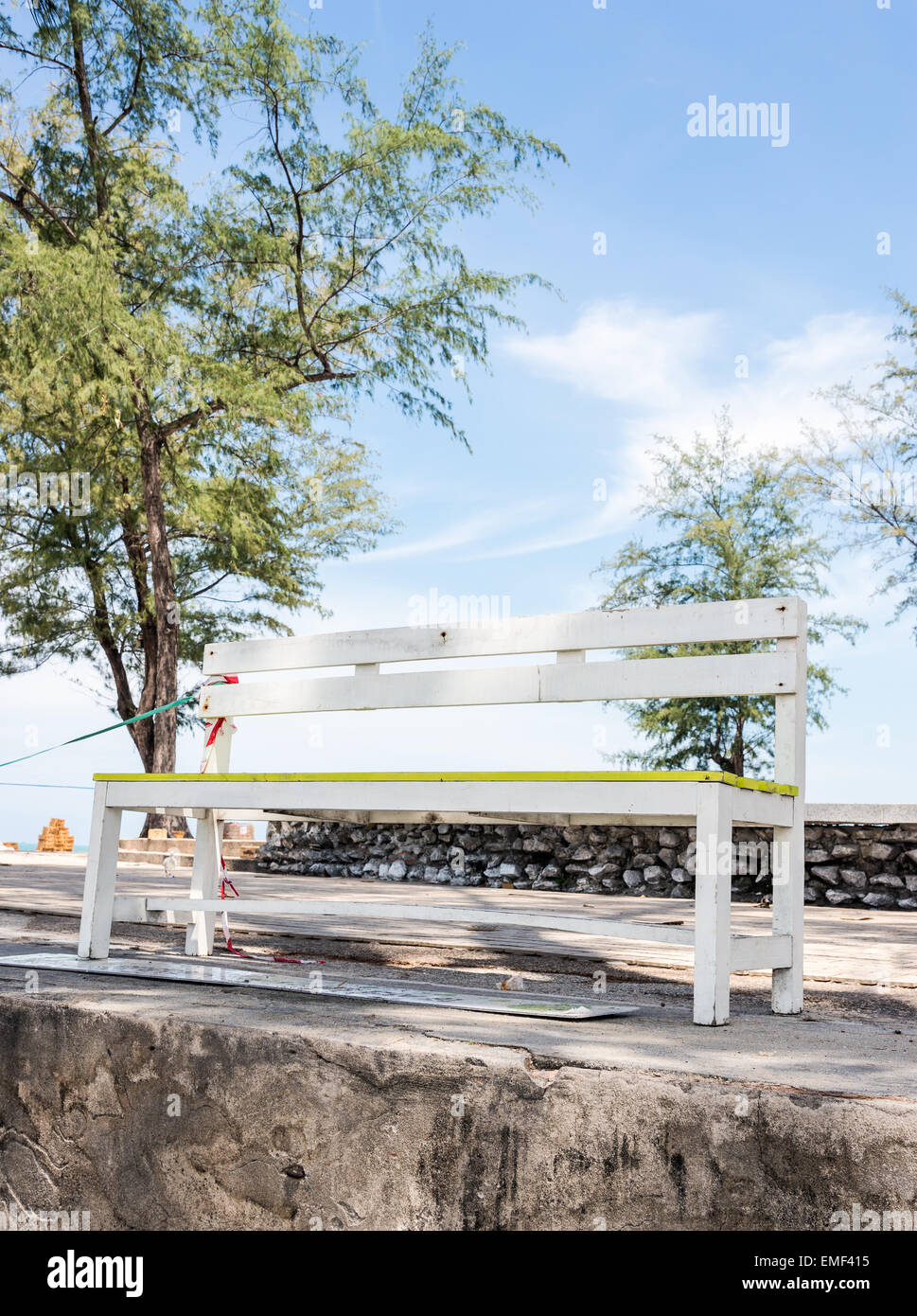 White wooden bench behind the sea in summer time Stock Photo - Alamy