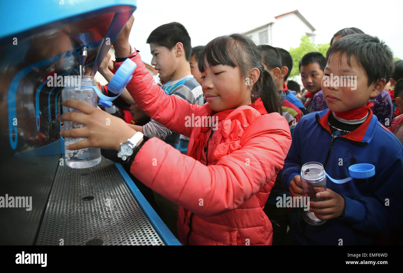 Changsha, China's Hunan Province. 20th Apr, 2015. Pupils get water from ...