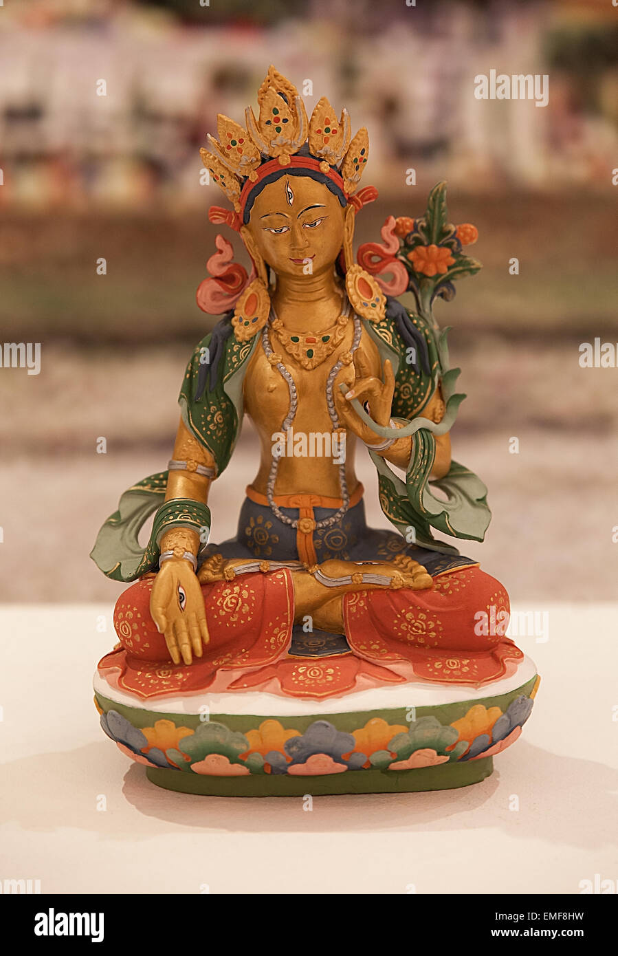 Statue where Buddha is sitting legs crossed and meditating Stock Photo ...