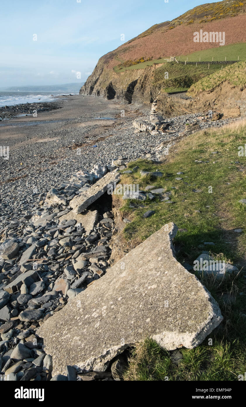 Broken sea defence wall that came down the coast from Aberystwyth after ...