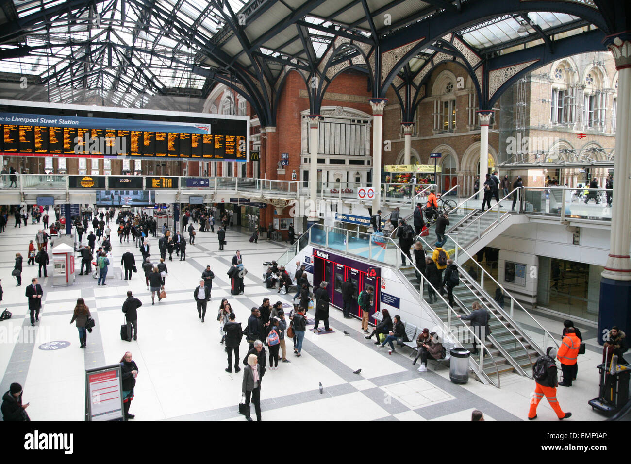 Liverpool Street Station, interior view with commuters and travellers ...