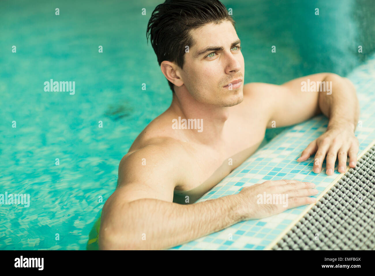 Young man in the swimming pool Stock Photo - Alamy