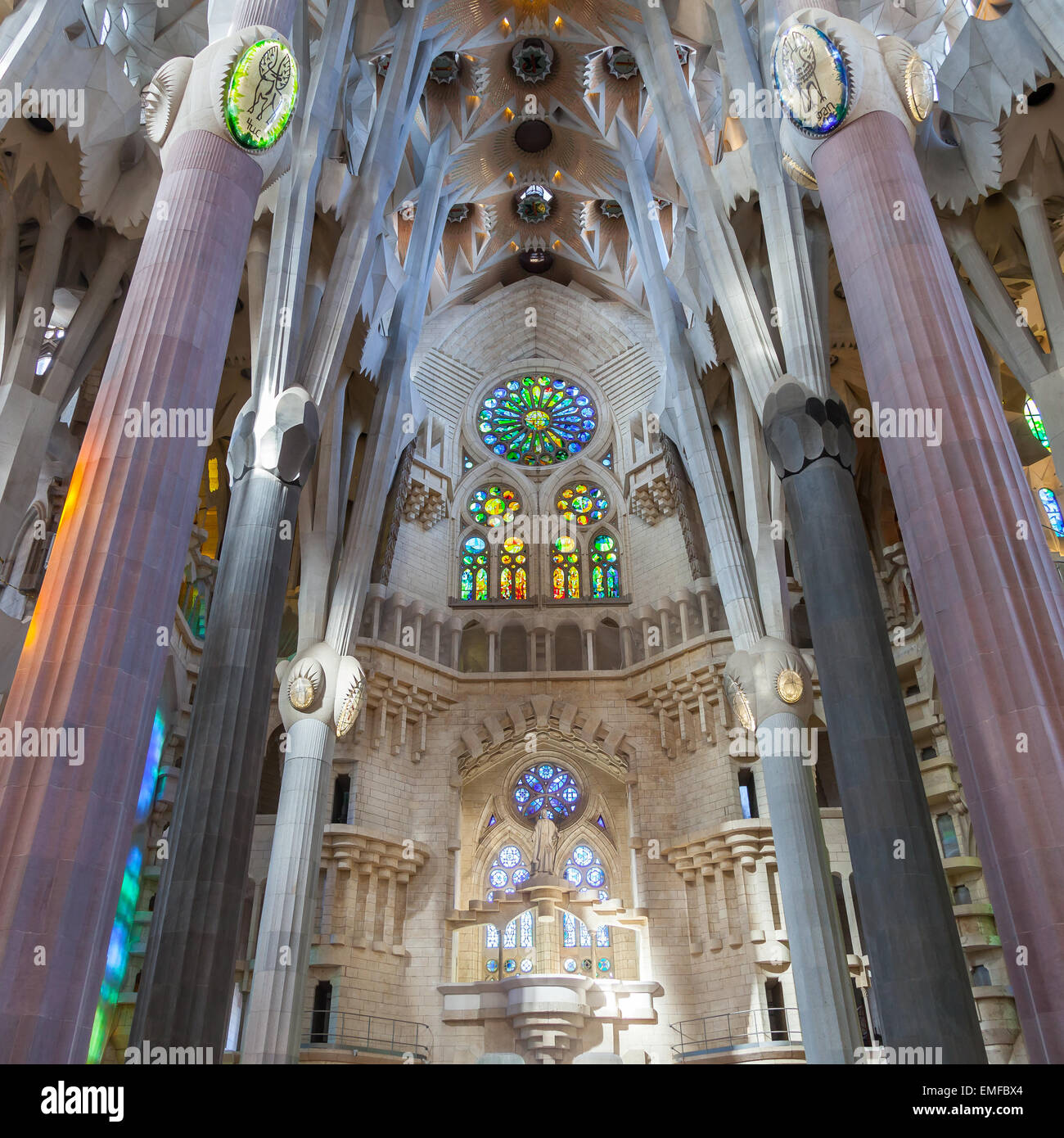 The sun shines through the stained glass windows of Gaudi's masterpiece ...