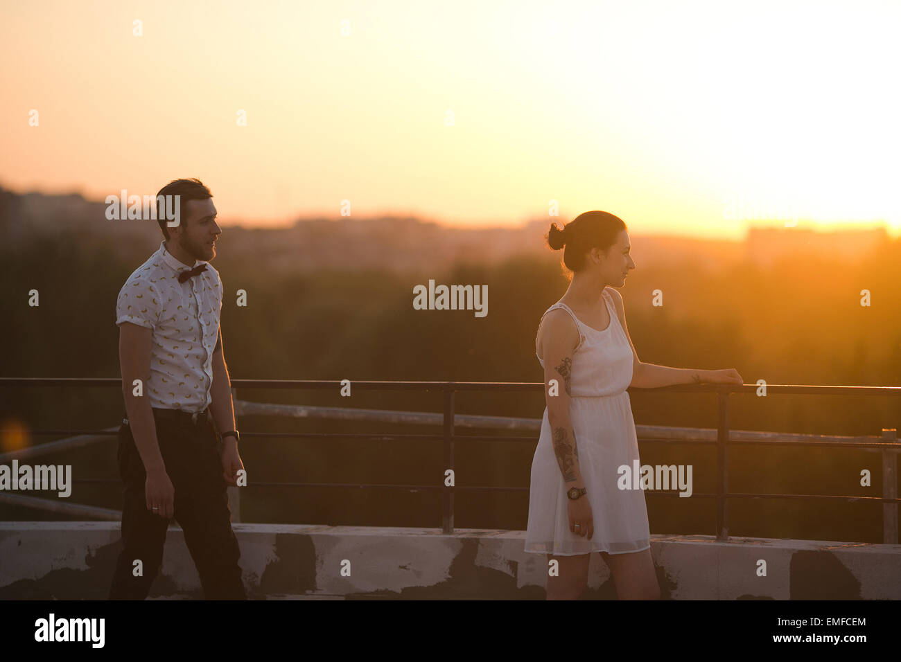 beautiful couple together on the roof of a tall building Stock Photo ...