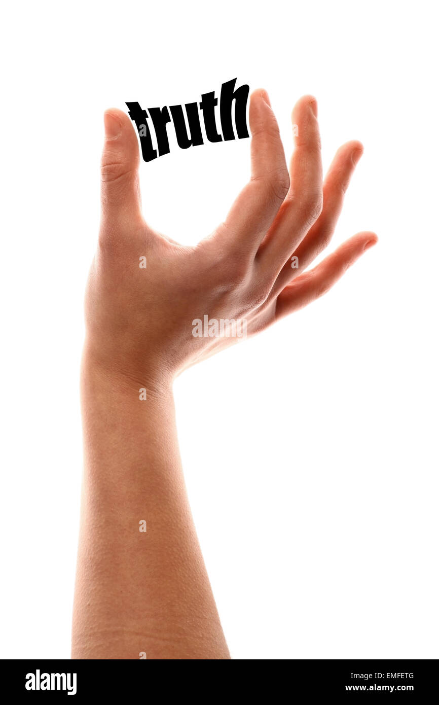 Color vertical shot of a of a hand squeezing the word "truth Stock ...