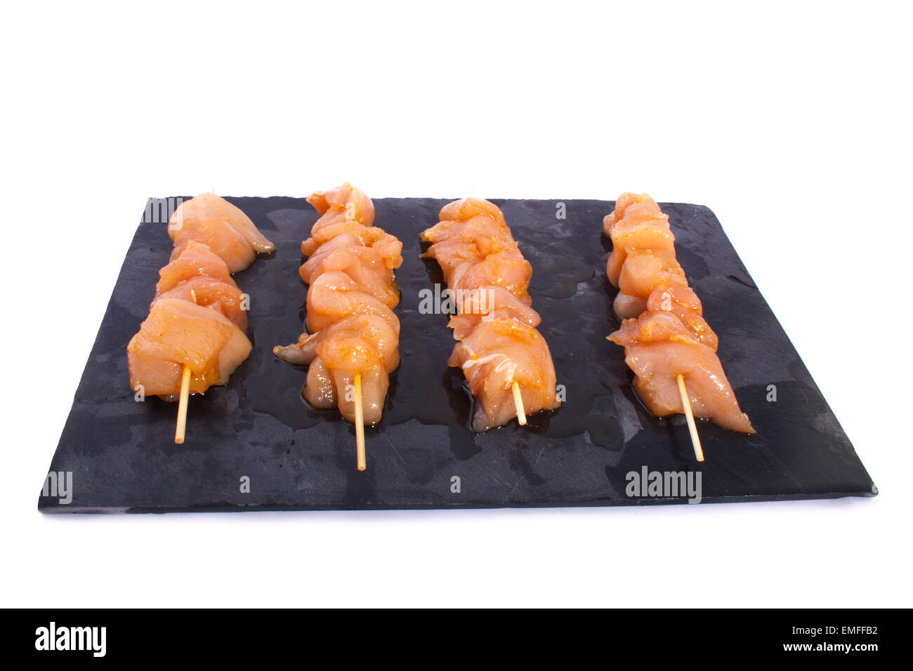 chicken sticks raw isolated on a white background Stock Photo - Alamy