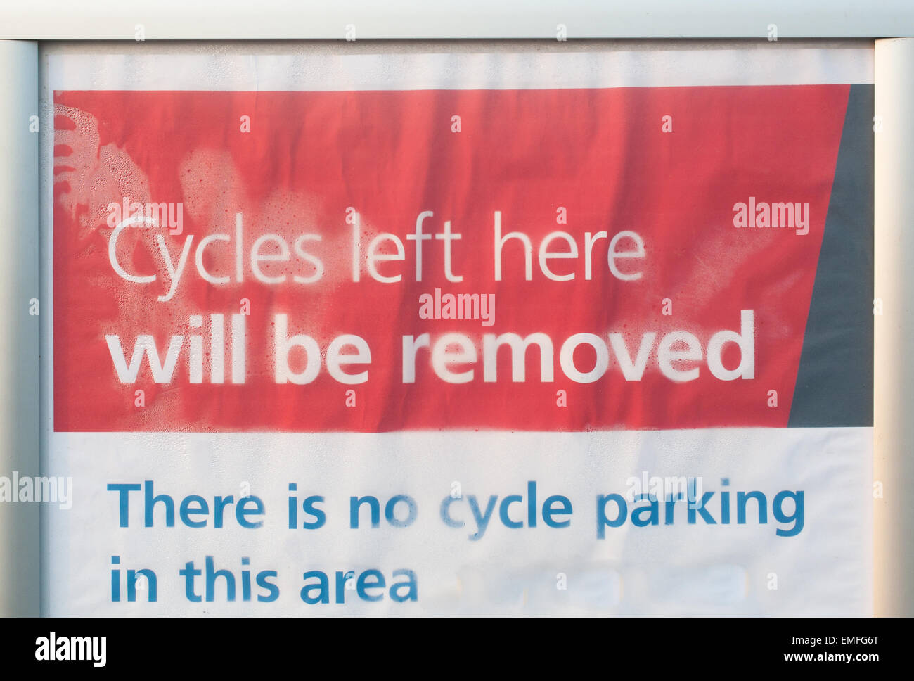 Plastic covered sign for warning cyclists Stock Photo - Alamy