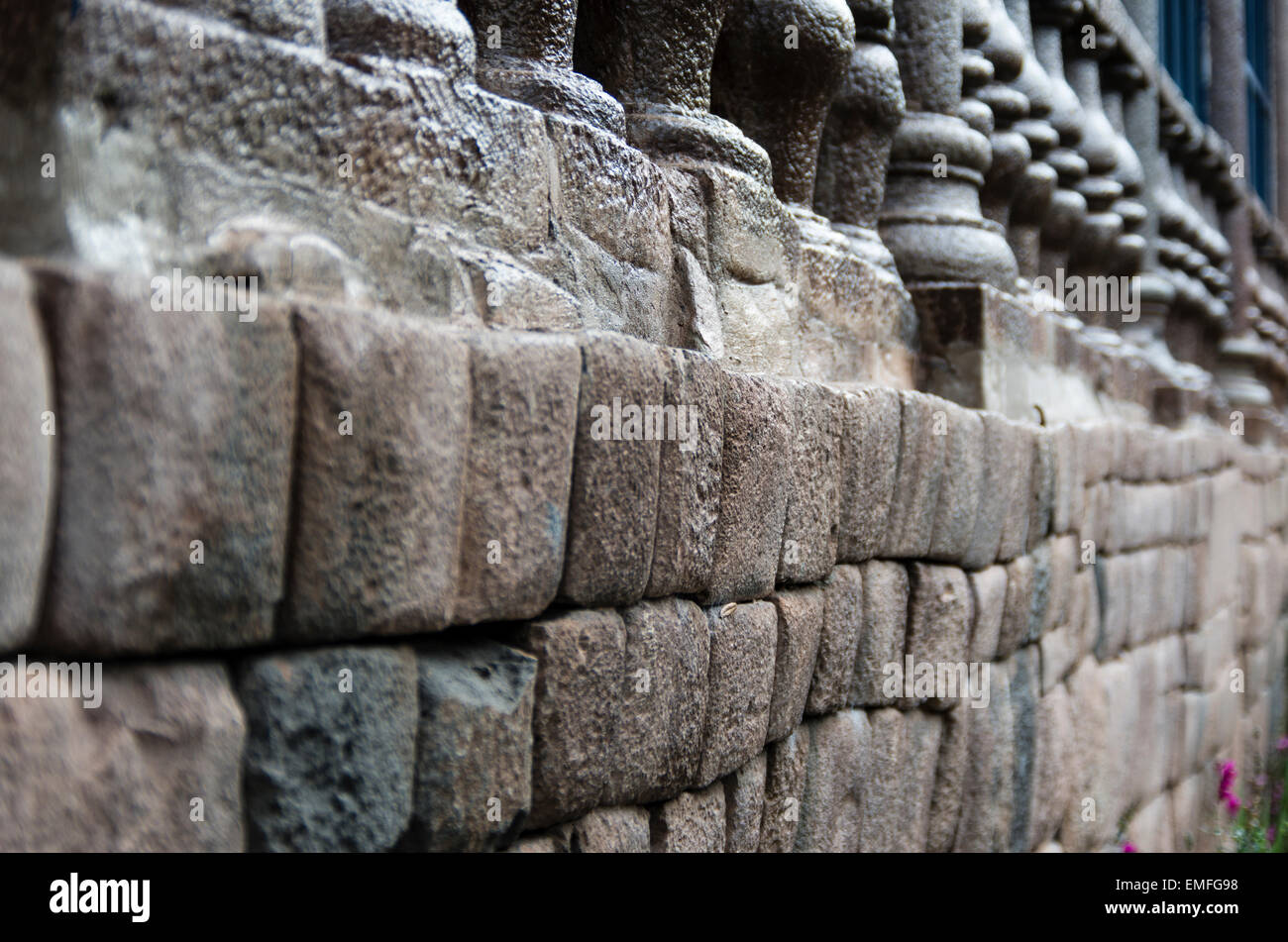 Spanish colonial architecture on a wall of Inca stone in Cusco, Peru ...