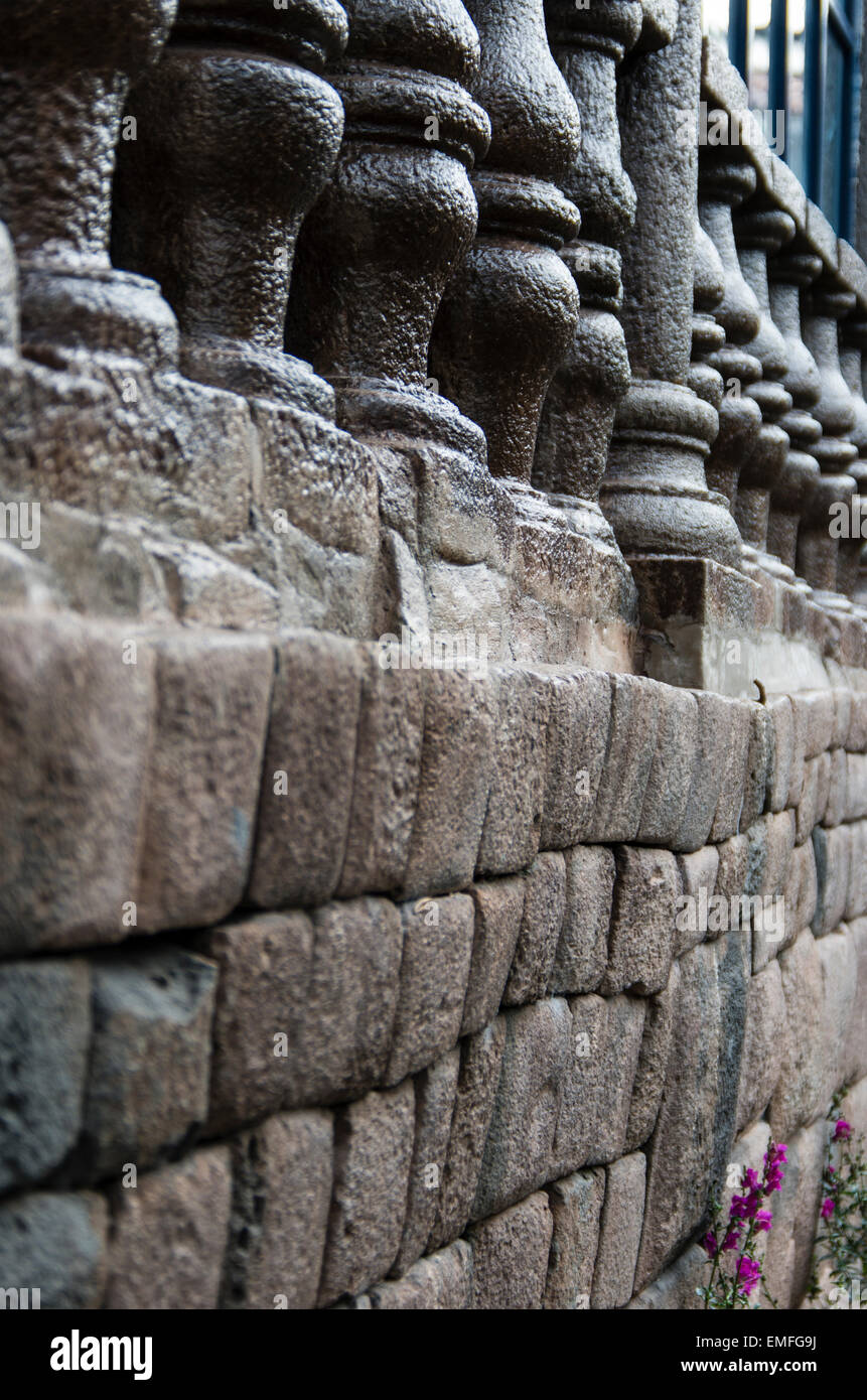 Spanish colonial architecture on a wall of Inca stone in Cusco, Peru ...