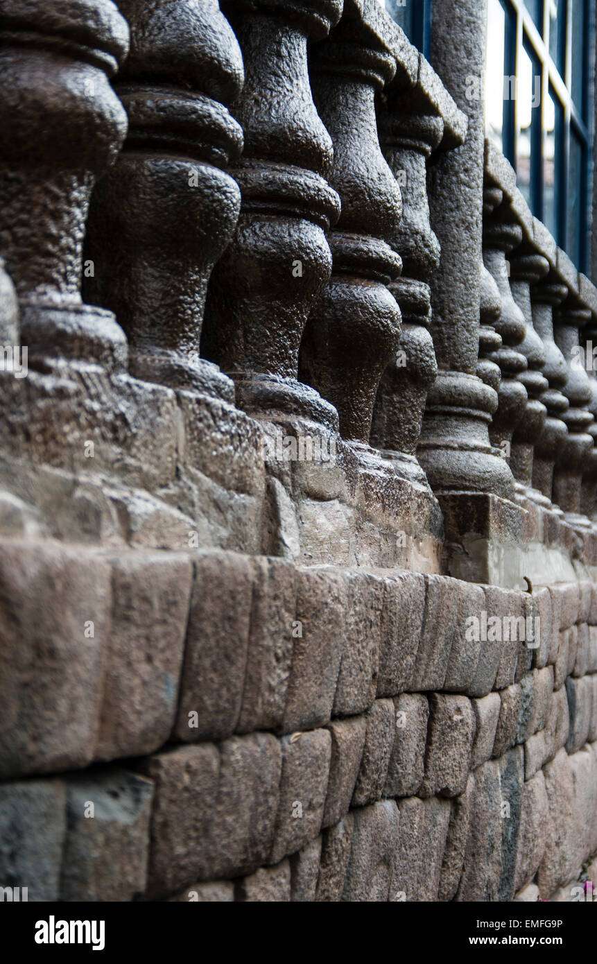 Spanish colonial architecture on a wall of Inca stone in Cusco, Peru ...