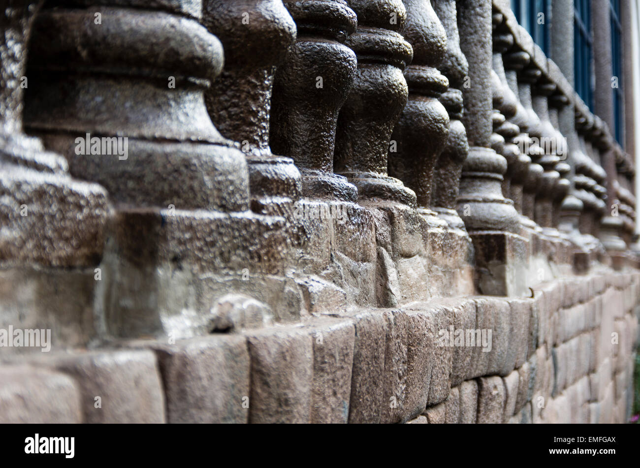 Spanish colonial architecture on a wall of Inca stone in Cusco, Peru ...