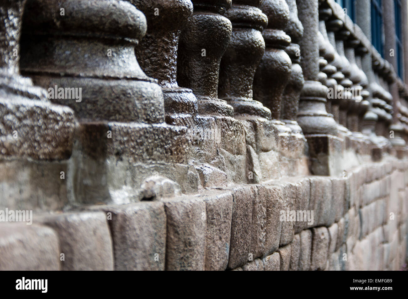 Spanish colonial architecture on a wall of Inca stone in Cusco, Peru ...