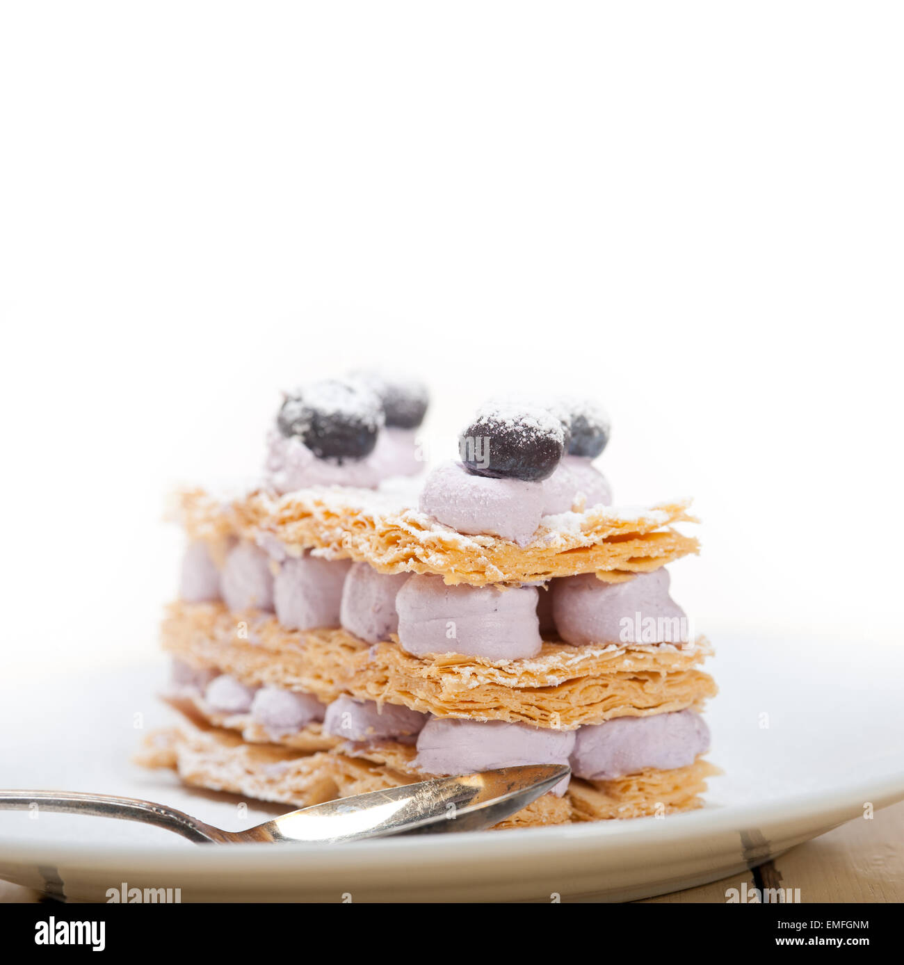 fresh baked napoleon blueberry and cream cake dessert Stock Photo - Alamy
