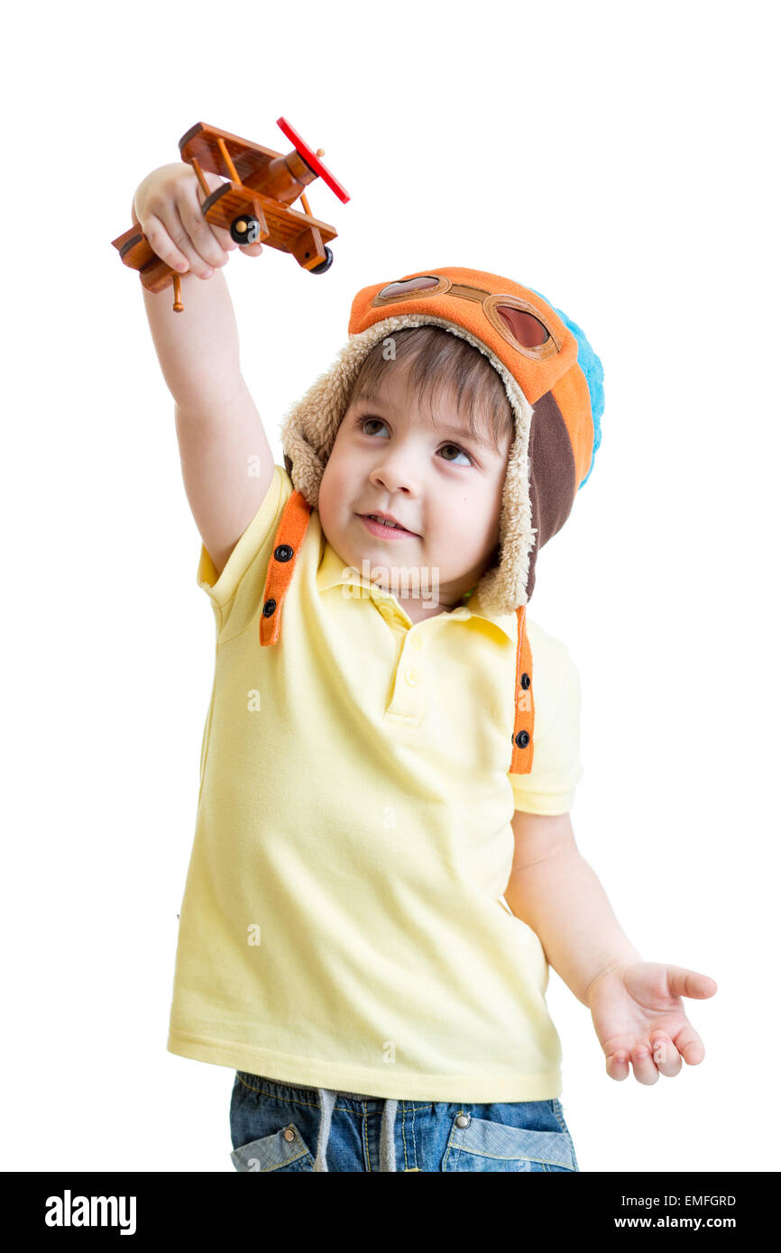 happy kid boy pilot and playing with wooden airplane toy Stock Photo ...