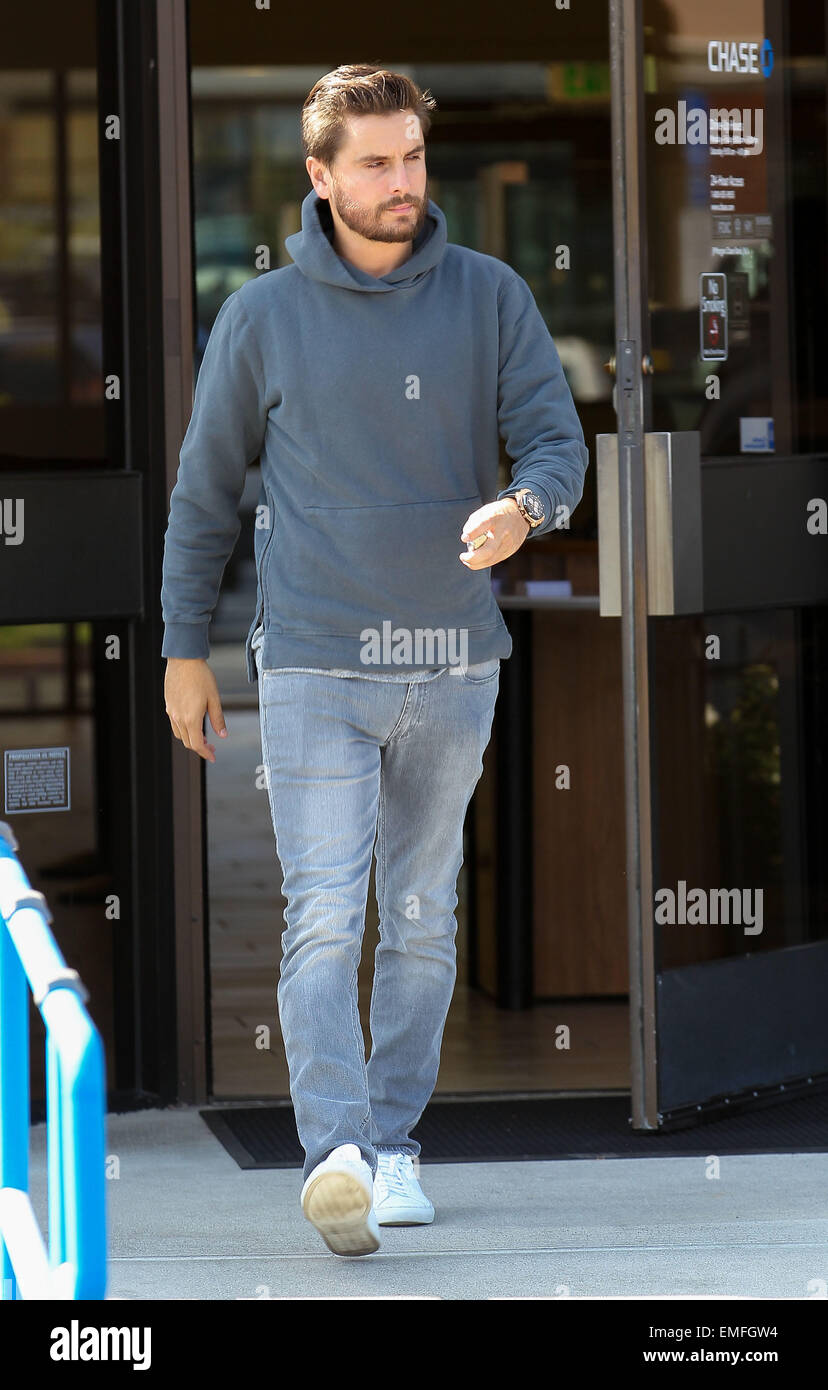 Scott Disick leaving Chase bank before driving away in a Bugatti Veyron ...