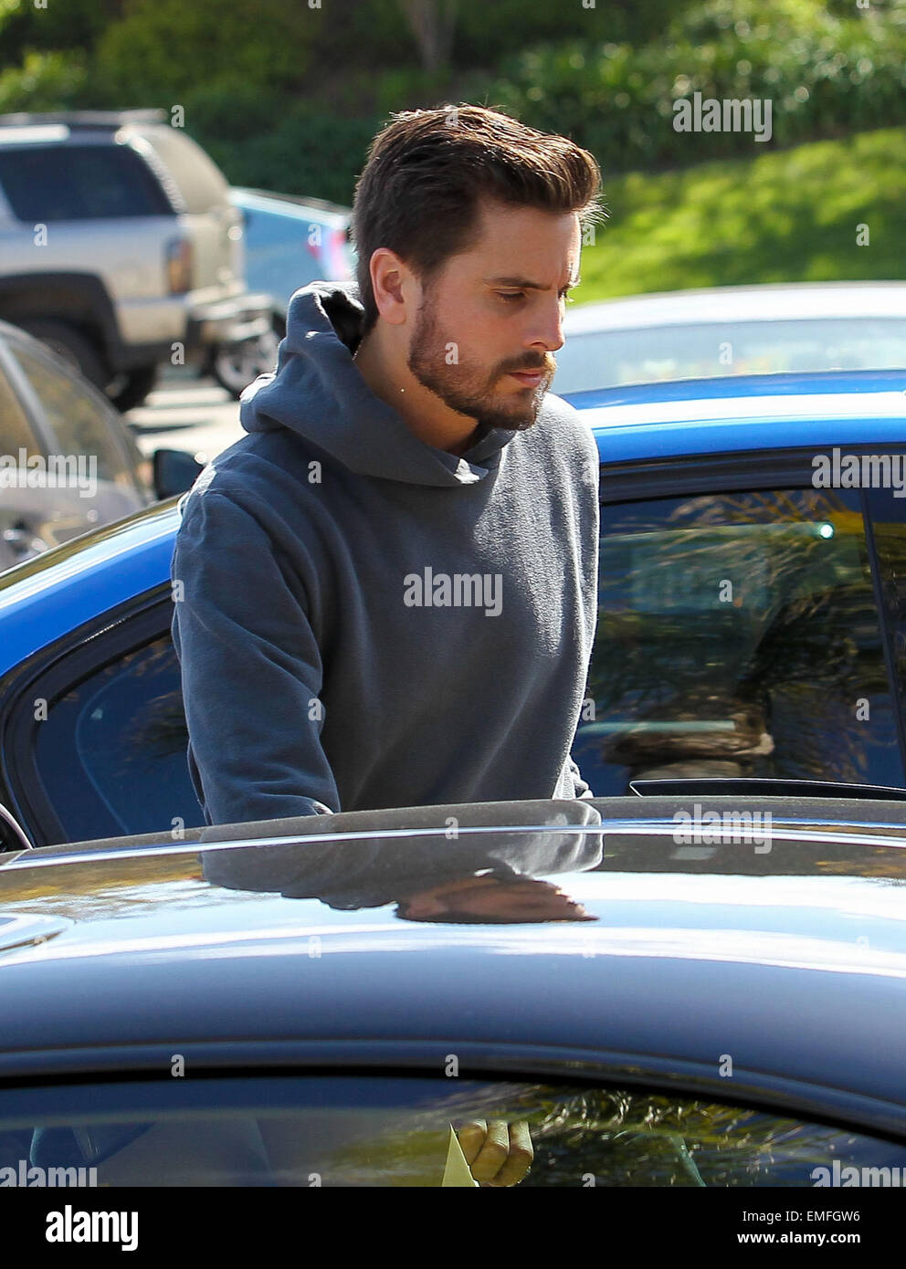 Scott Disick leaving Chase bank before driving away in a Bugatti Veyron ...