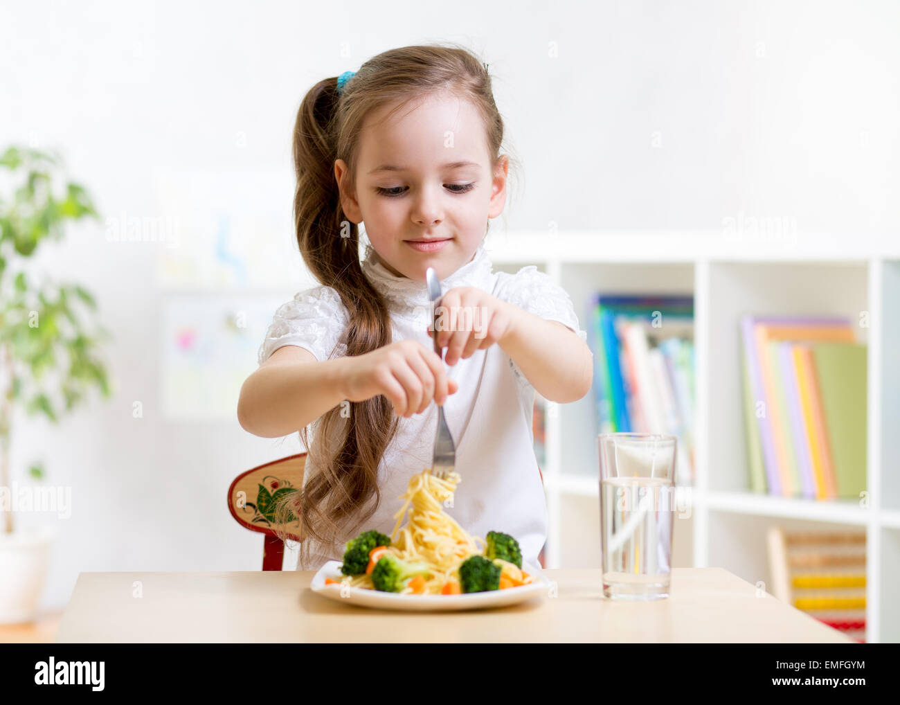 kid eating healthy food at home Stock Photo - Alamy