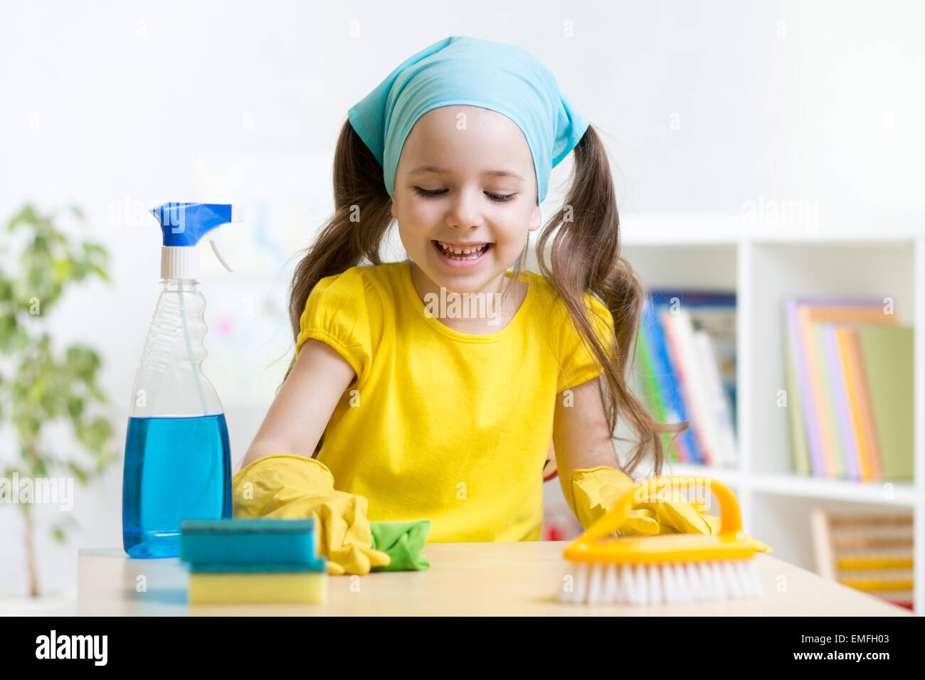 cute girl make cleaning in the children room at home Stock Photo - Alamy