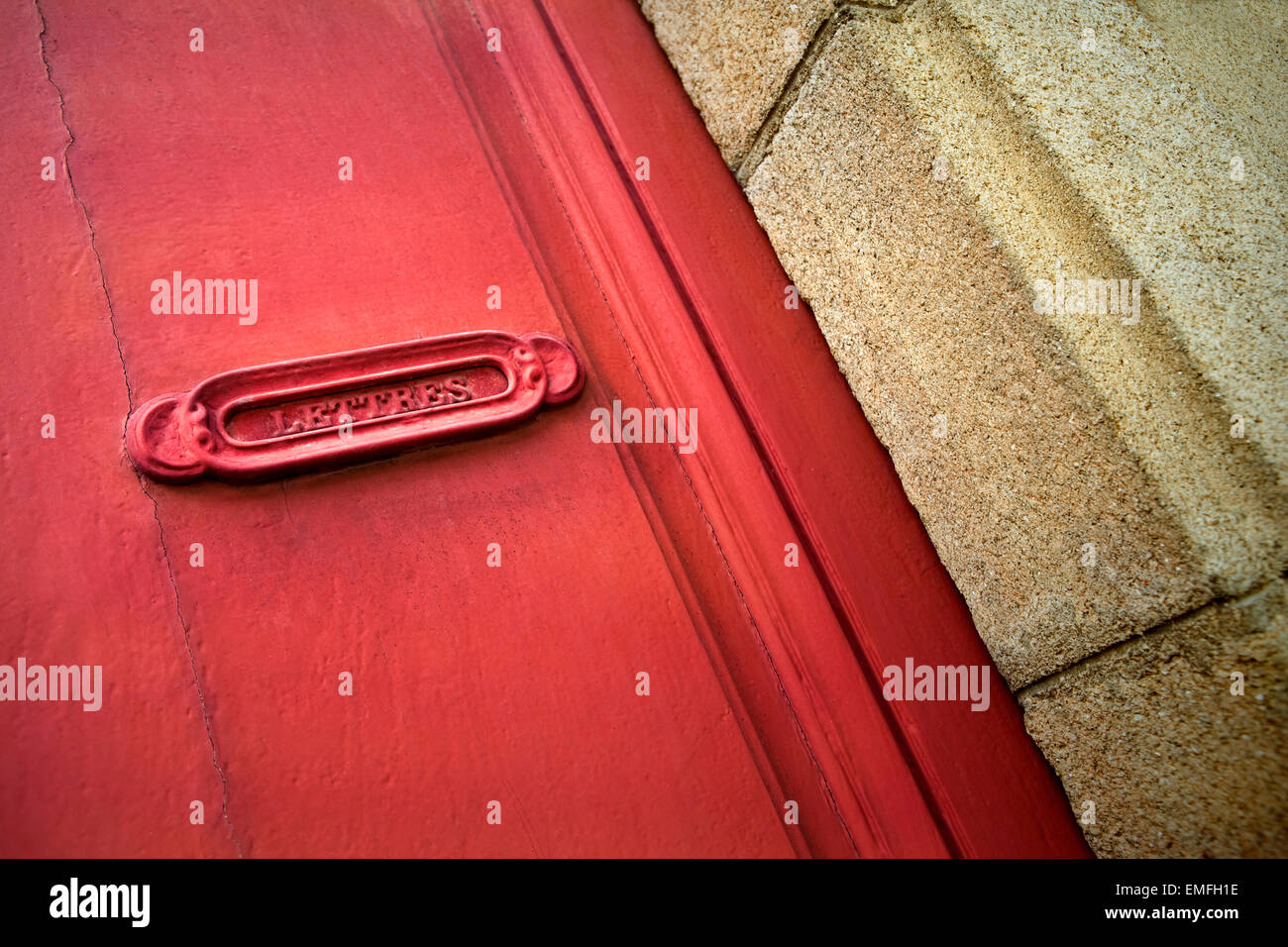 Old French letter box of a red door Stock Photo - Alamy