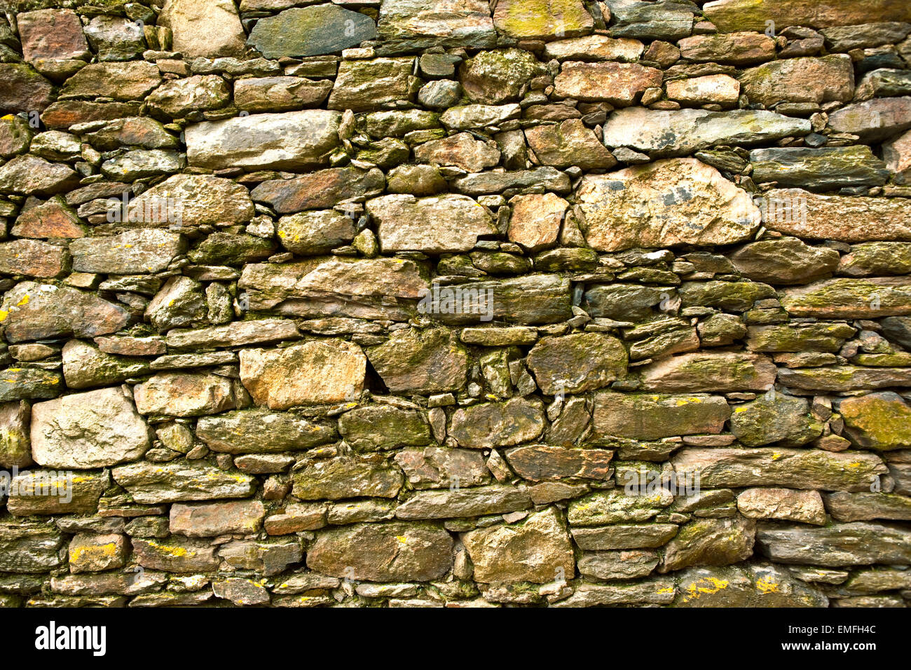 Old stoned wall in a French village Stock Photo - Alamy