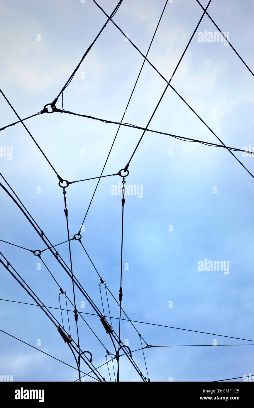 Electrical cables for the tram in the city Stock Photo - Alamy