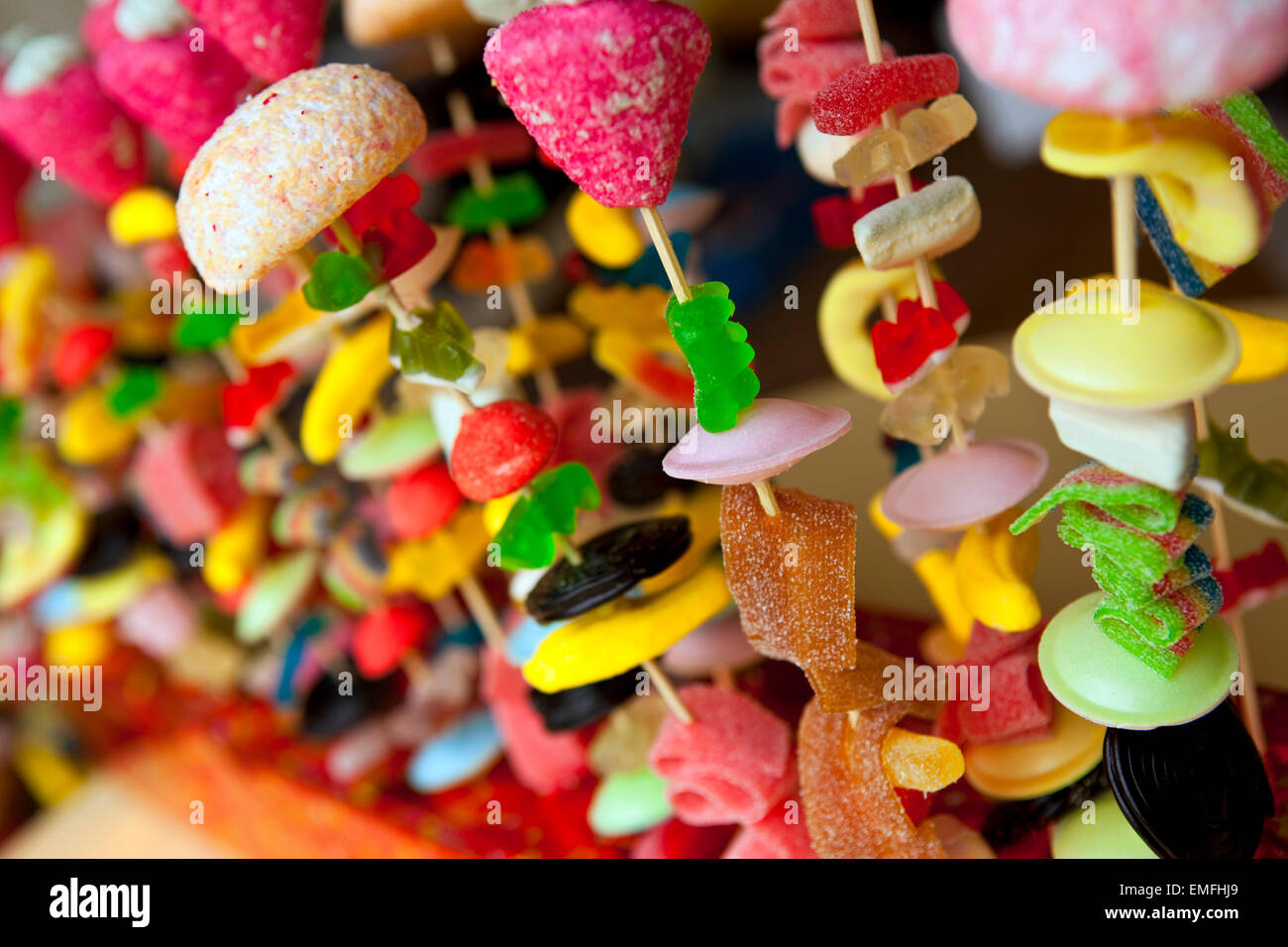 Close up of candy skewers in a candy shop Stock Photo - Alamy