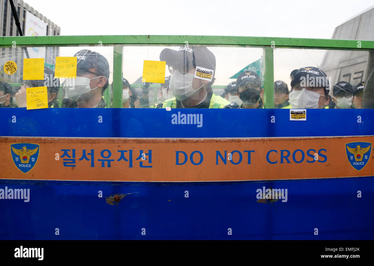 Ferry tragedy protest, Apr 18, 2015 : Policemen stand guard as ...