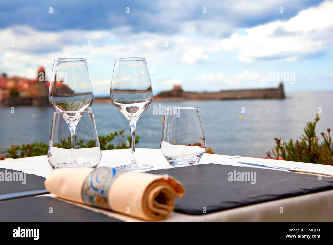 Table set on the terrace of a restaurant facing Mediterranean sea Stock ...