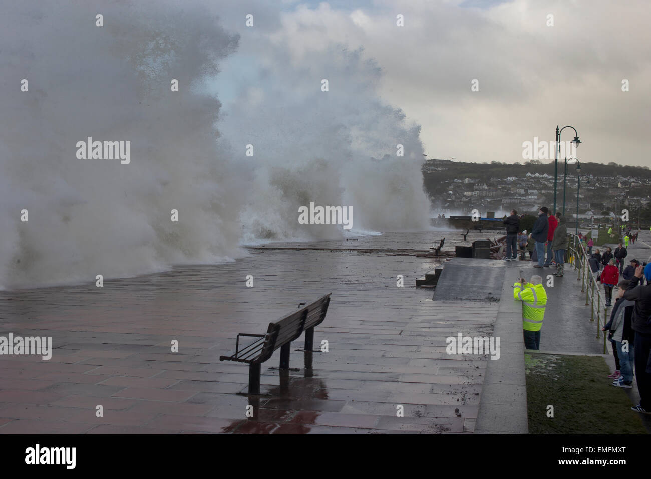 Waves from a storm surge breaking over an already damaged Promenade ...