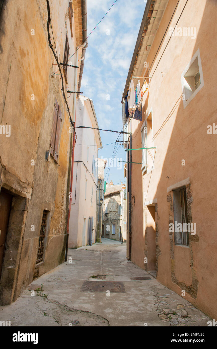 Old alley in French village Stock Photo - Alamy