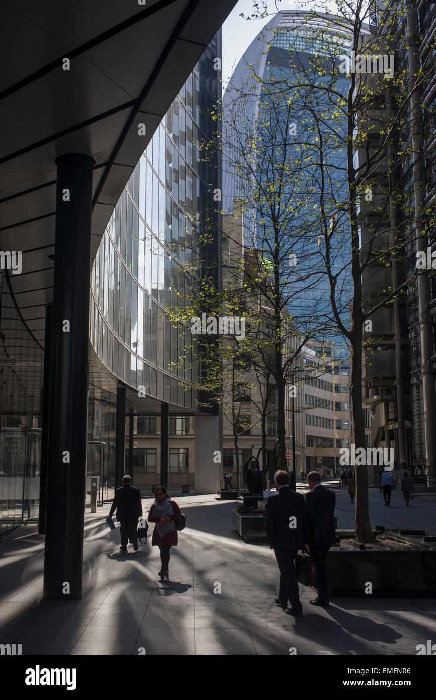 Urban modern cityscape looking down Lime Street in the City of London ...