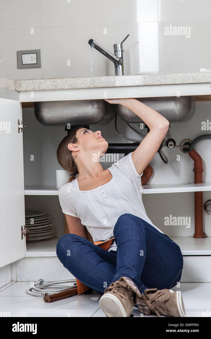 Female plumber model hi-res stock photography and images - Alamy