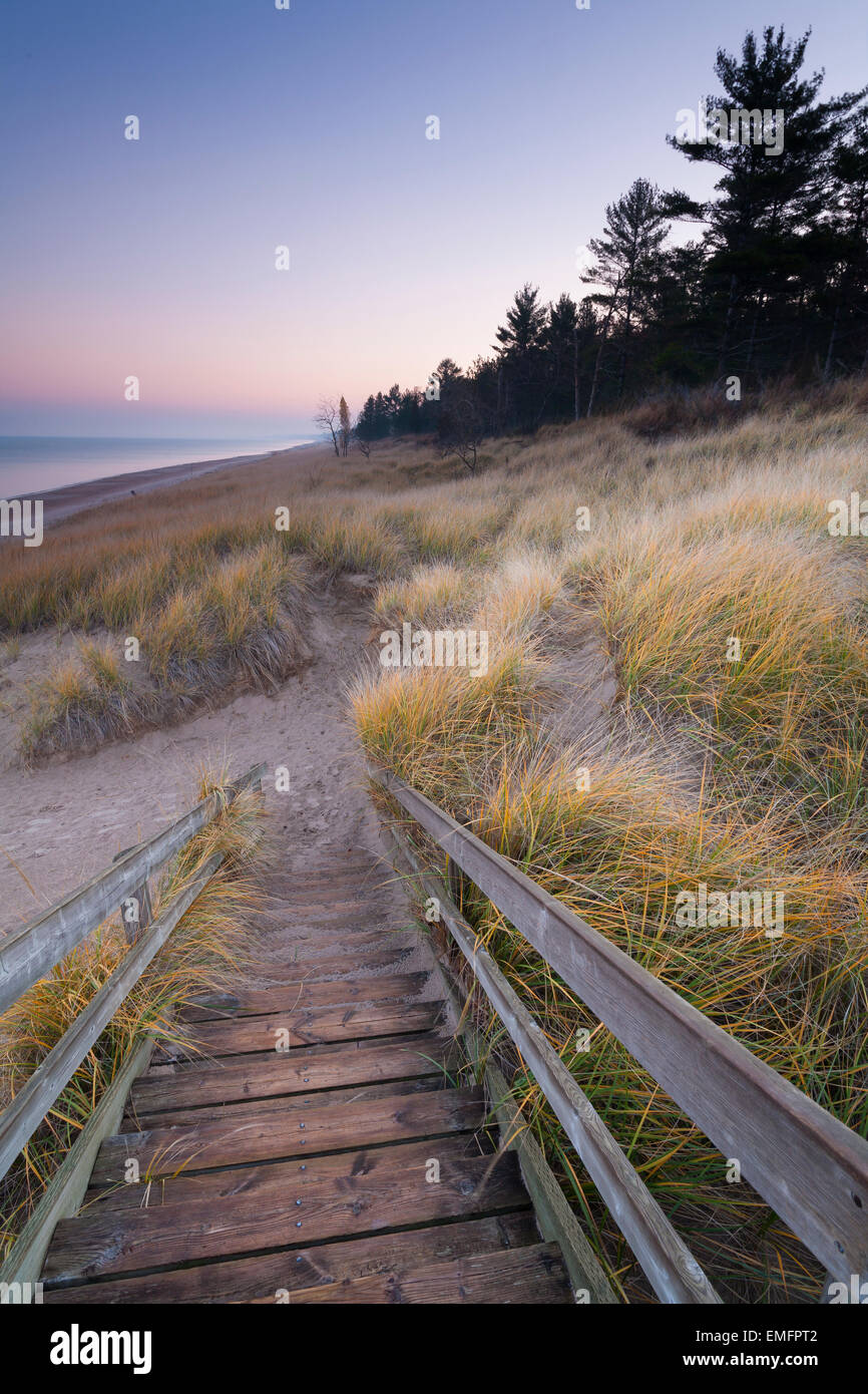 Stairs and a trail leading to a sandy beach along the shores of Lake ...