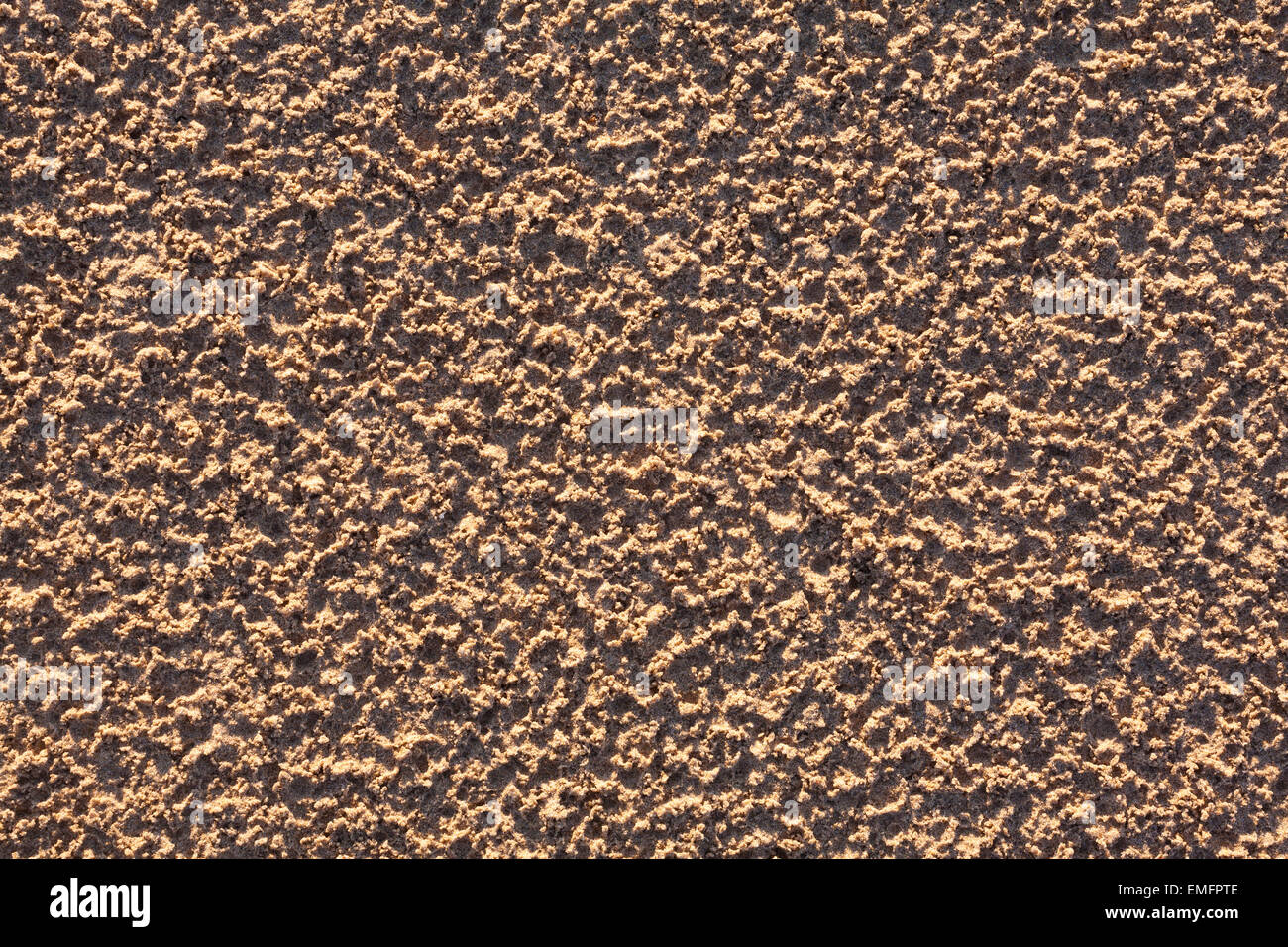 Interesting textures in beach sand with early morning side lighting ...