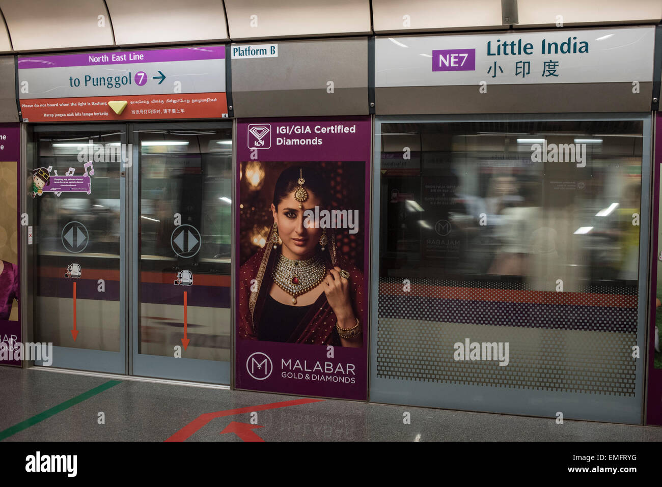 Passengers pass Little India station in MRT (Mass Rapid Transport ...