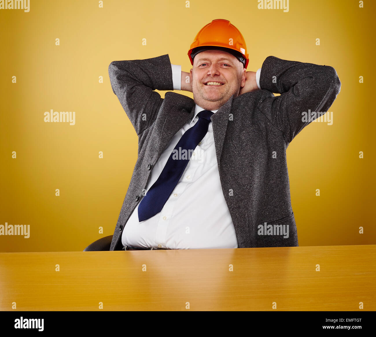 Working male engineer in office, he wearing a white shirt and tie and ...