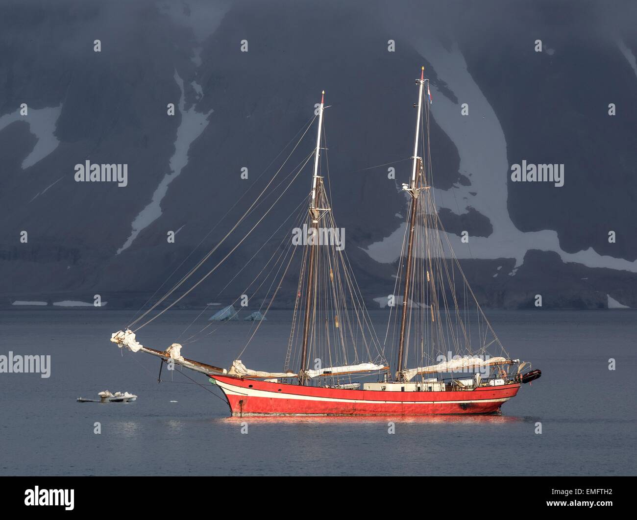 Red yacht in the Arctic fjord - Spitsbergen, Svalbard Stock Photo - Alamy