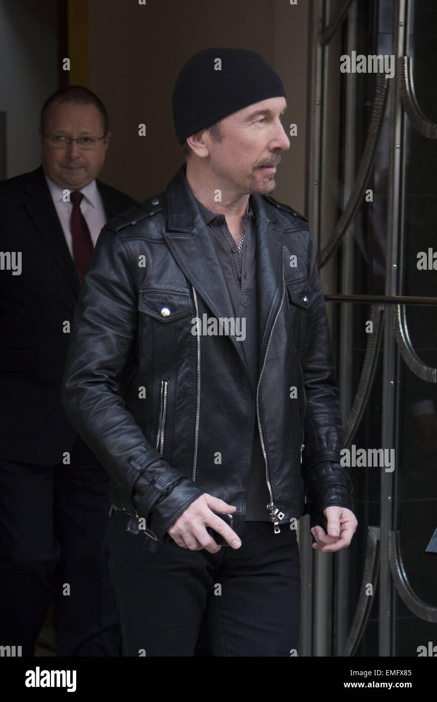 Rock band U2 sign autographs for fans outside the Claridge's Hotel ...