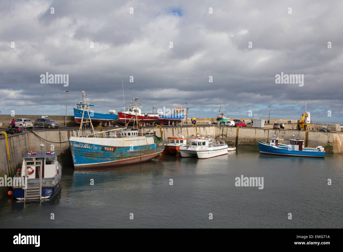Seahouses Harbour with moored fishing boats, Northumberland Coast ...