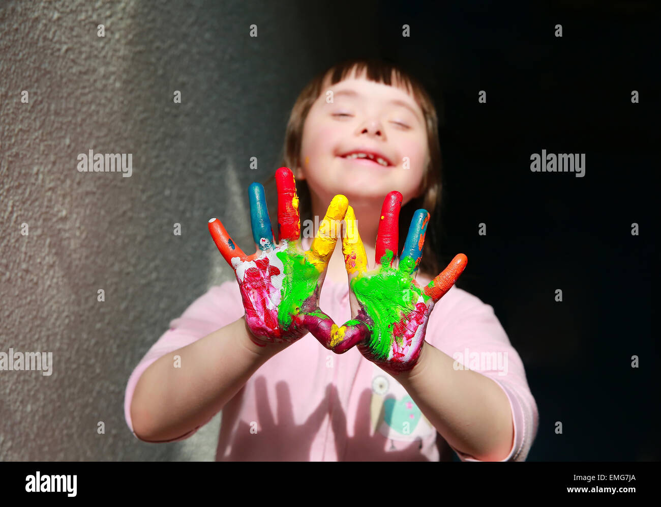 Cute little girl painted hands down hi-res stock photography and images ...