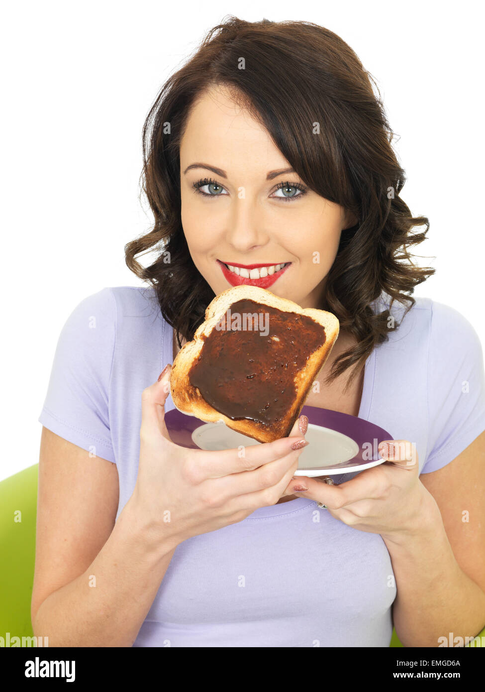 Woman eating toast breakfast hot buttered hi-res stock photography and ...